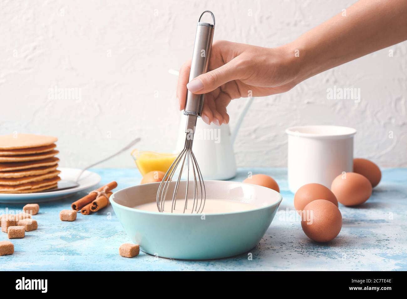 Woman making dough pancakes in hi-res stock photography and images - Alamy