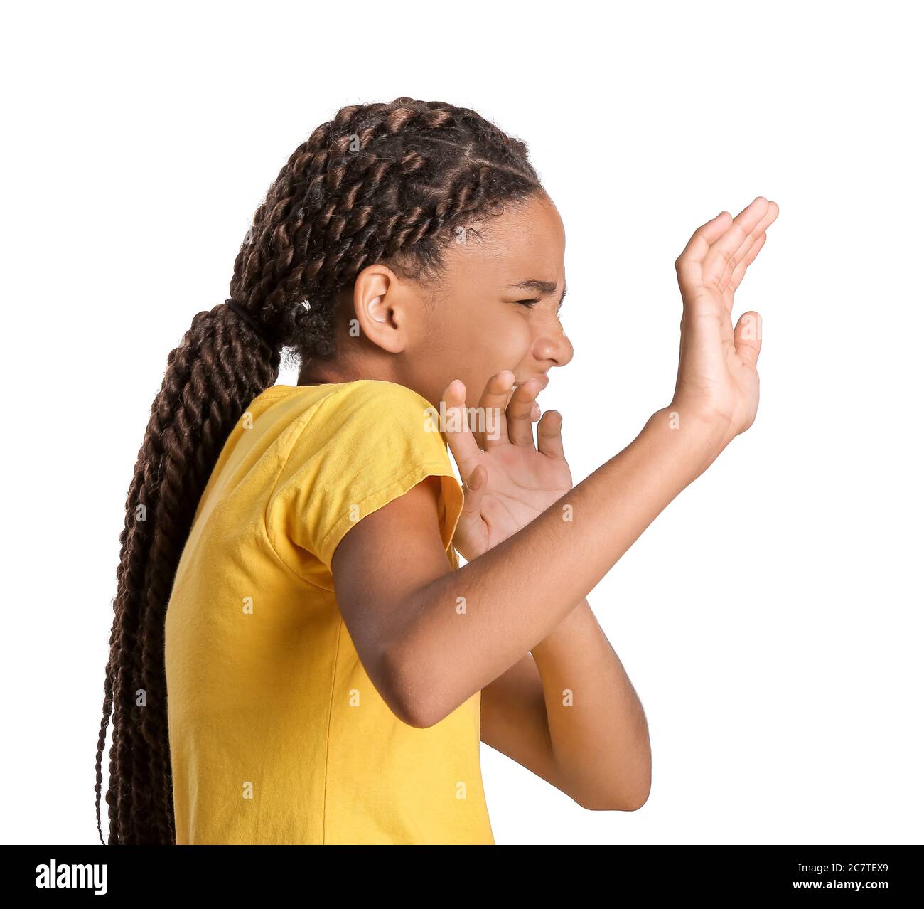 Scared African-American girl on white background. Stop racism Stock ...