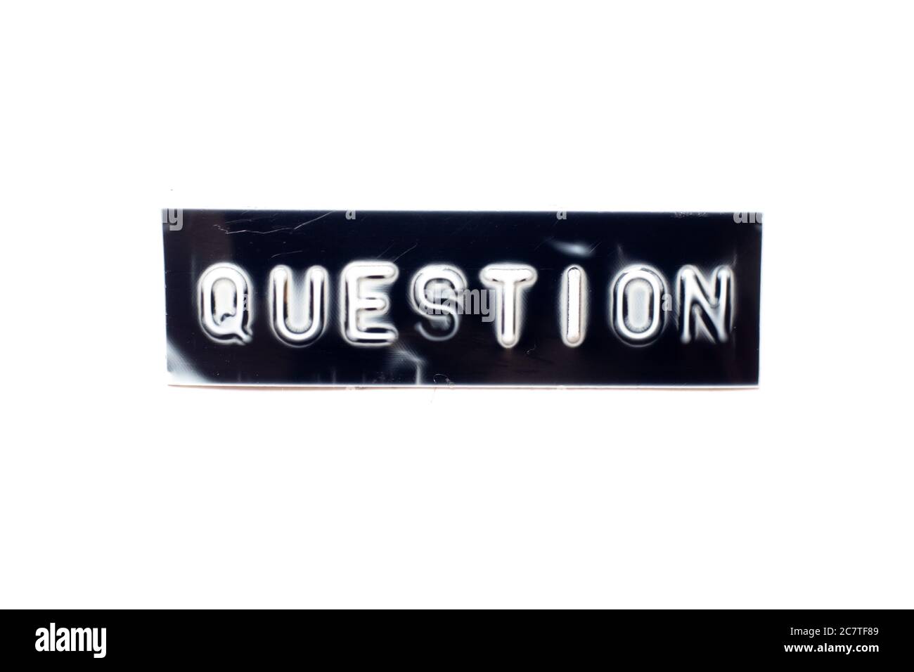 Embossed letter in word question in black banner on white background ...