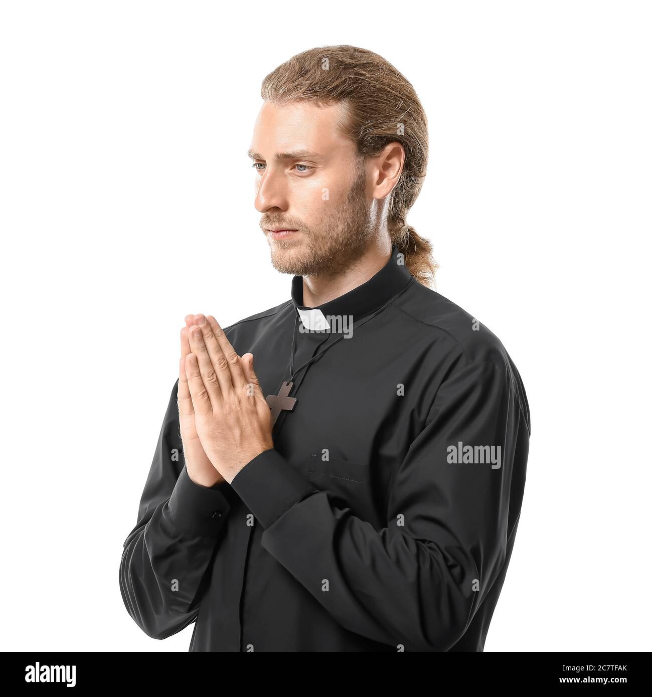 Praying priest on white background Stock Photo - Alamy