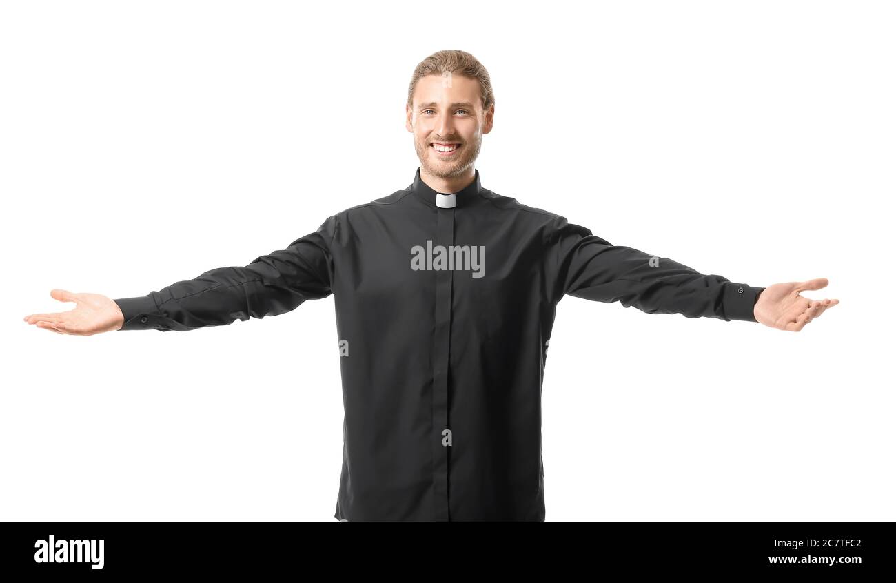 Handsome priest on white background Stock Photo - Alamy