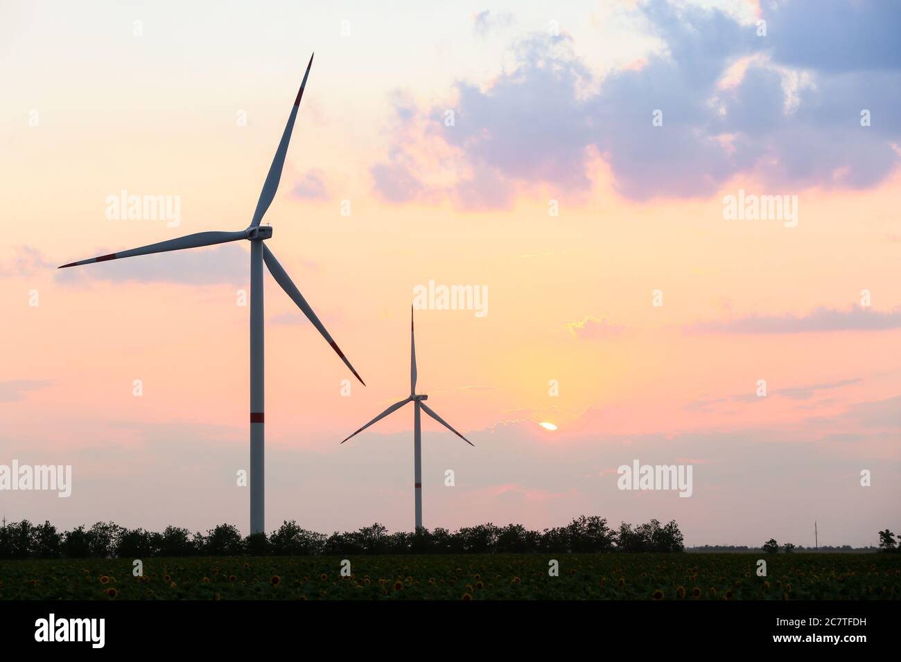 Windmills for electric power in countryside Stock Photo - Alamy
