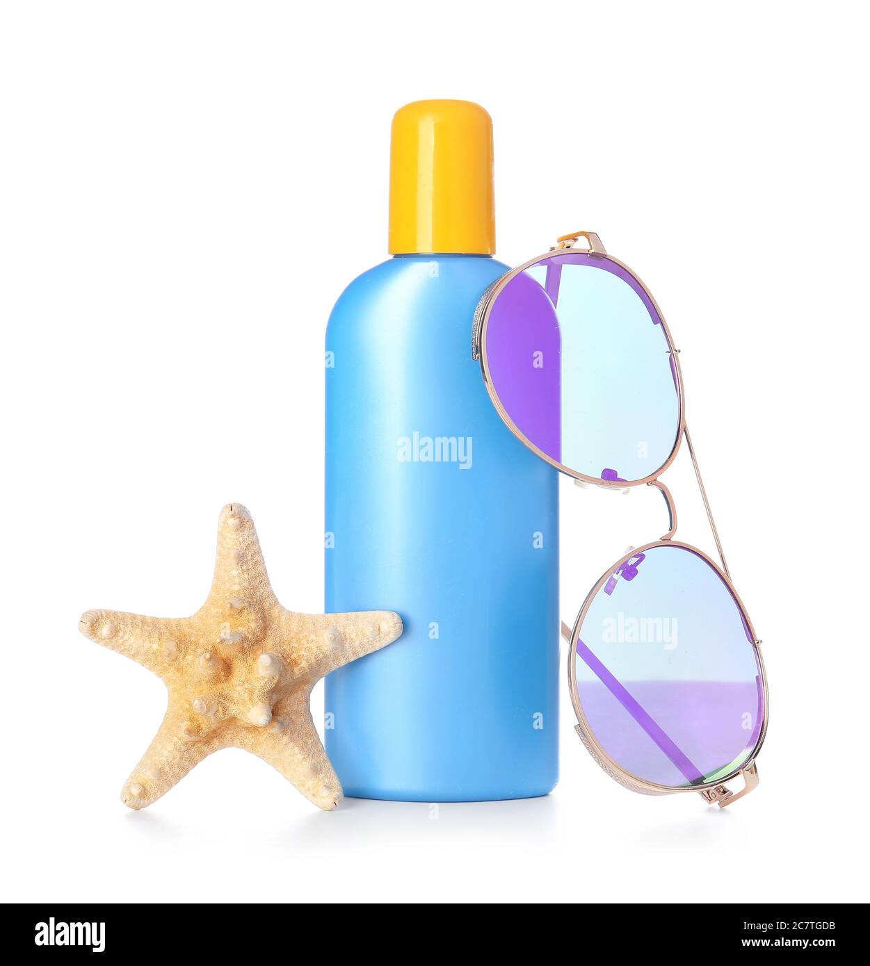 Bottle of sunscreen with sunglasses on white background Stock Photo - Alamy
