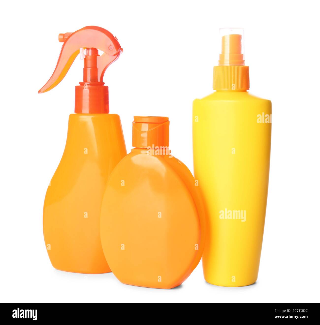 Bottles of sunscreen on white background Stock Photo - Alamy