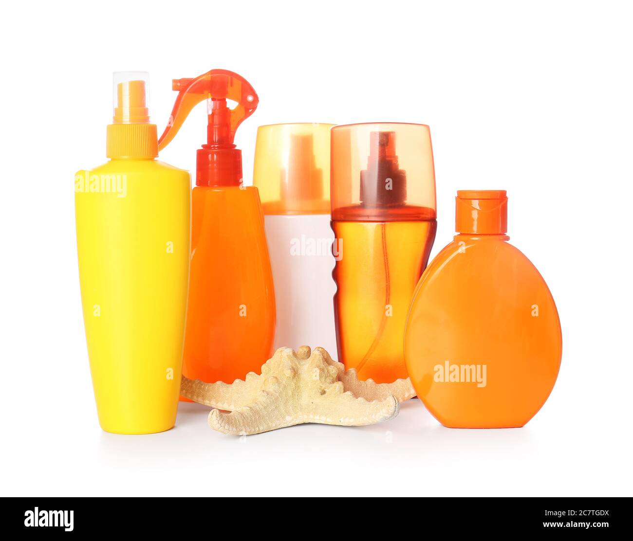Bottles of sunscreen on white background Stock Photo - Alamy