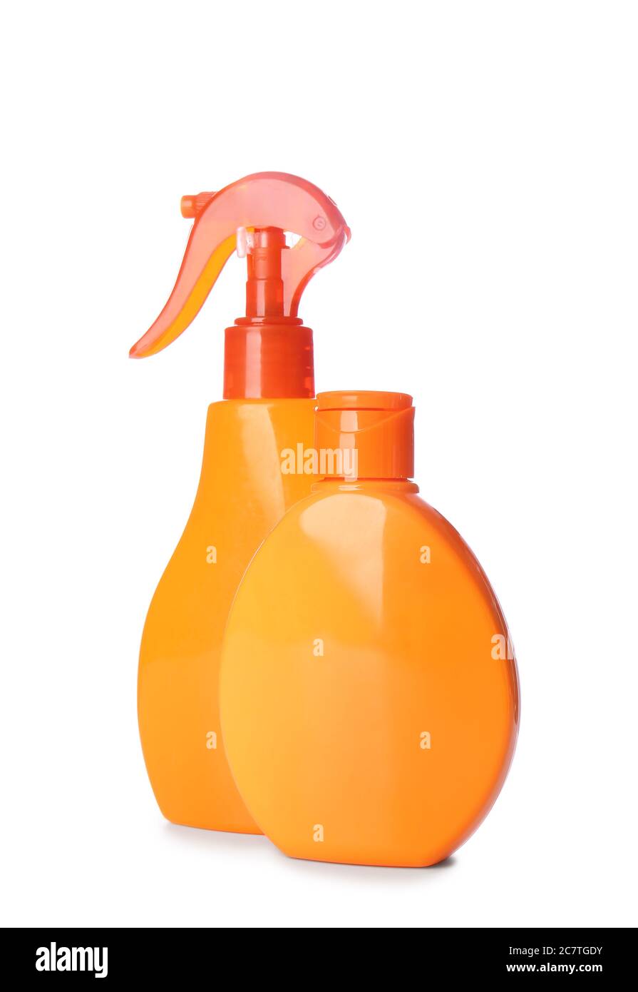 Bottles of sunscreen on white background Stock Photo - Alamy