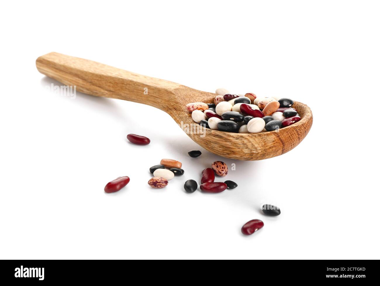 Spoon with raw beans on white background Stock Photo - Alamy