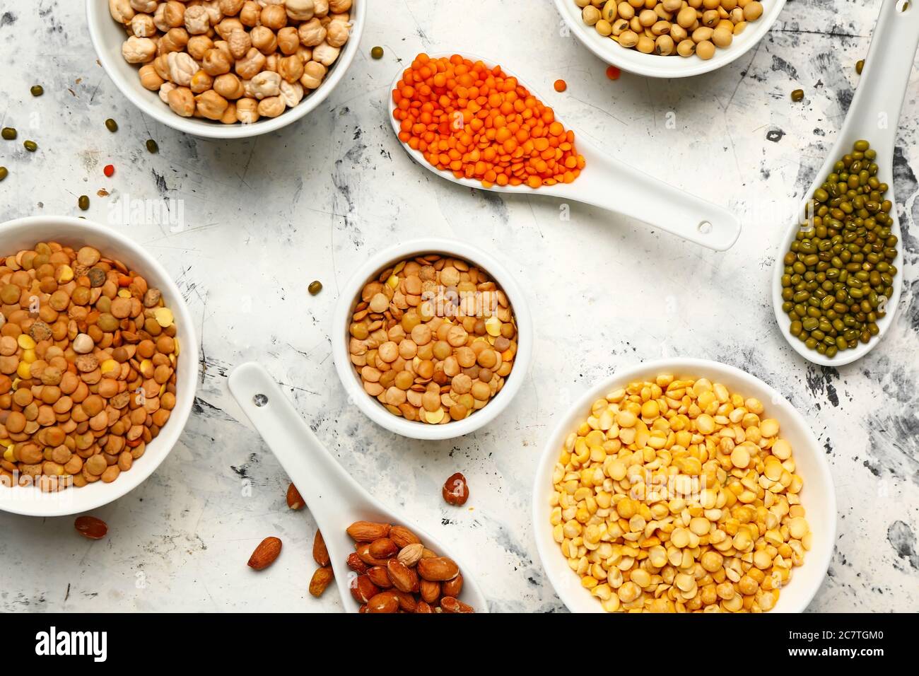 Different raw legumes on white background Stock Photo - Alamy