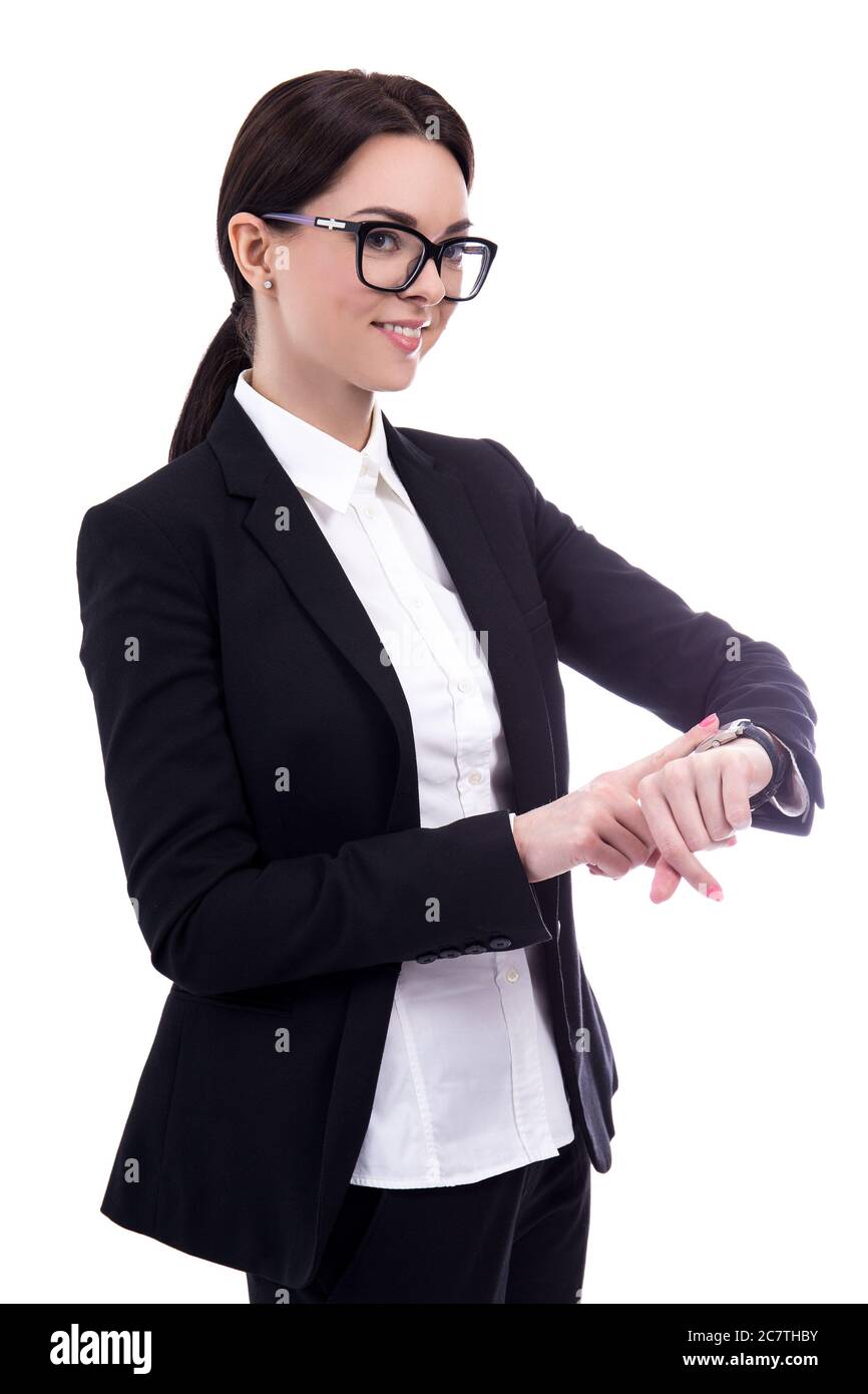portrait of young business woman checks time on her wrist watch ...