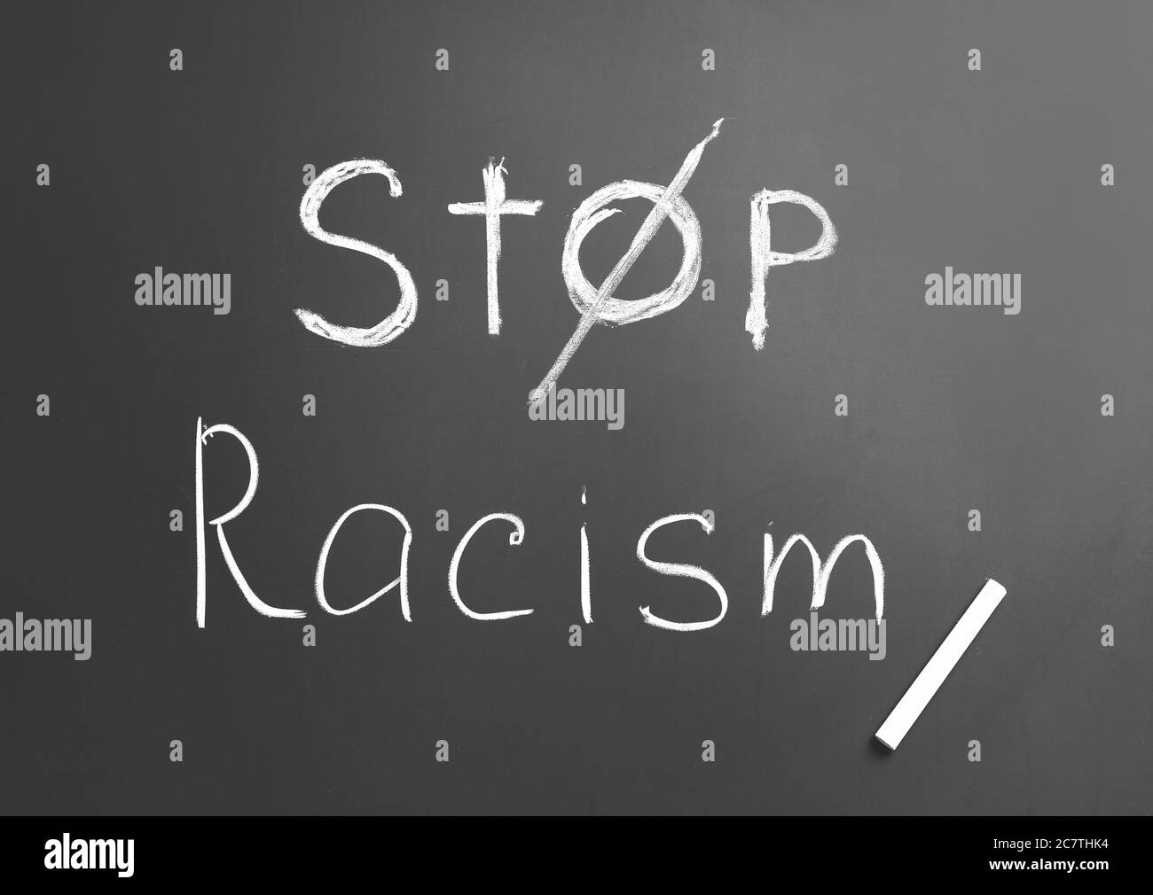 Text STOP RACISM written on chalkboard Stock Photo - Alamy