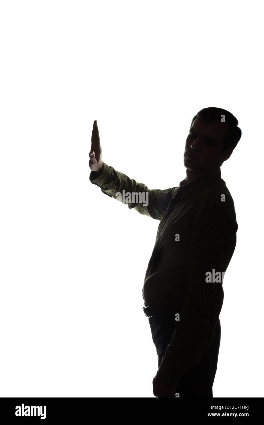 Silhouette man hands raised hi-res stock photography and images - Alamy
