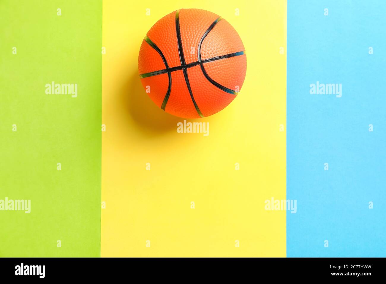 Ball for playing basketball game on color background Stock Photo - Alamy