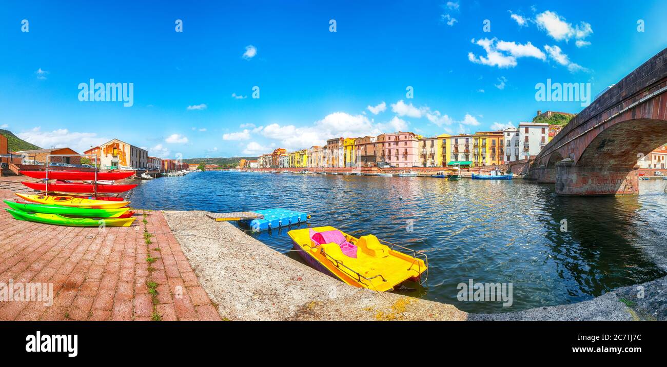 Astonishing cityscape of Bosa town with Ponte Vecchio bridge across the ...