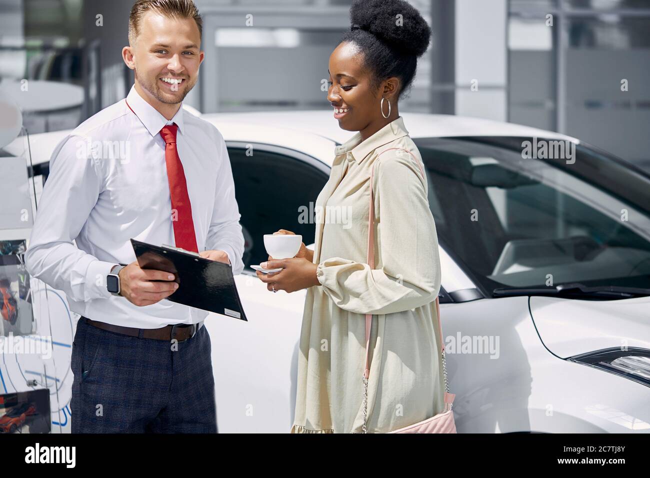 Car salesman sitting desk in hi-res stock photography and images - Alamy