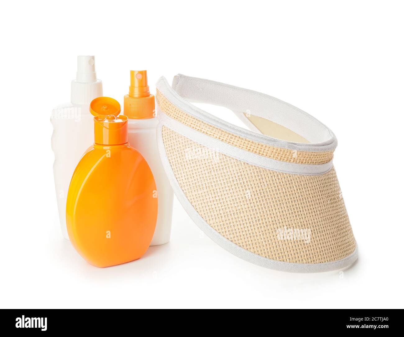 Bottles of sunscreen with hat on white background Stock Photo - Alamy