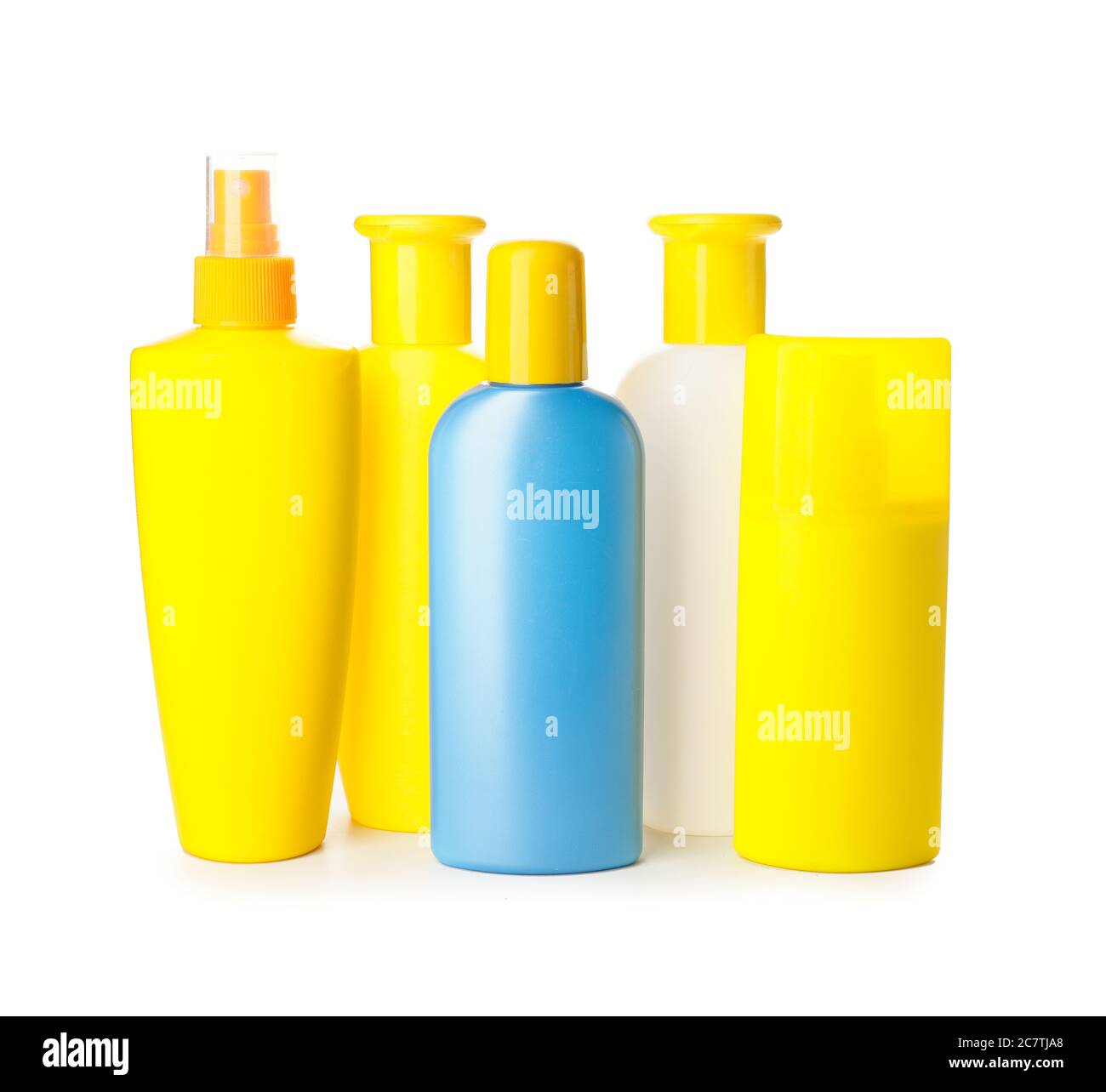 Bottles of sunscreen on white background Stock Photo - Alamy