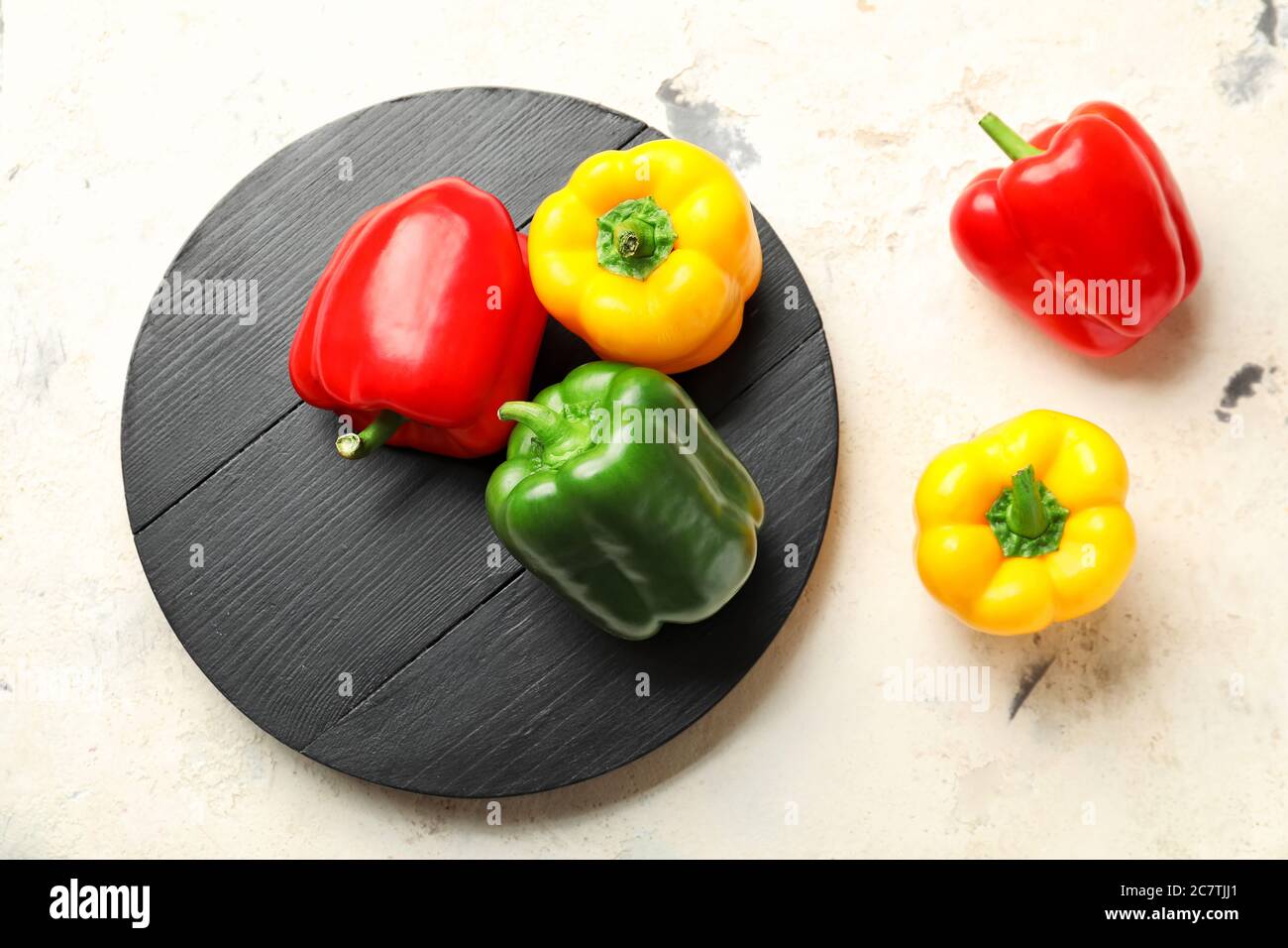 Fresh bell peppers on white background Stock Photo - Alamy