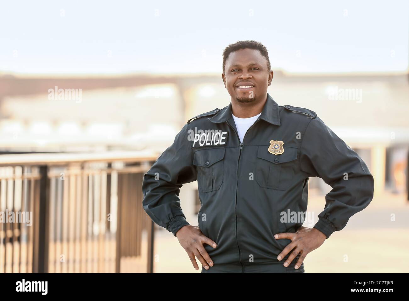 African-American police officer in the street Stock Photo - Alamy
