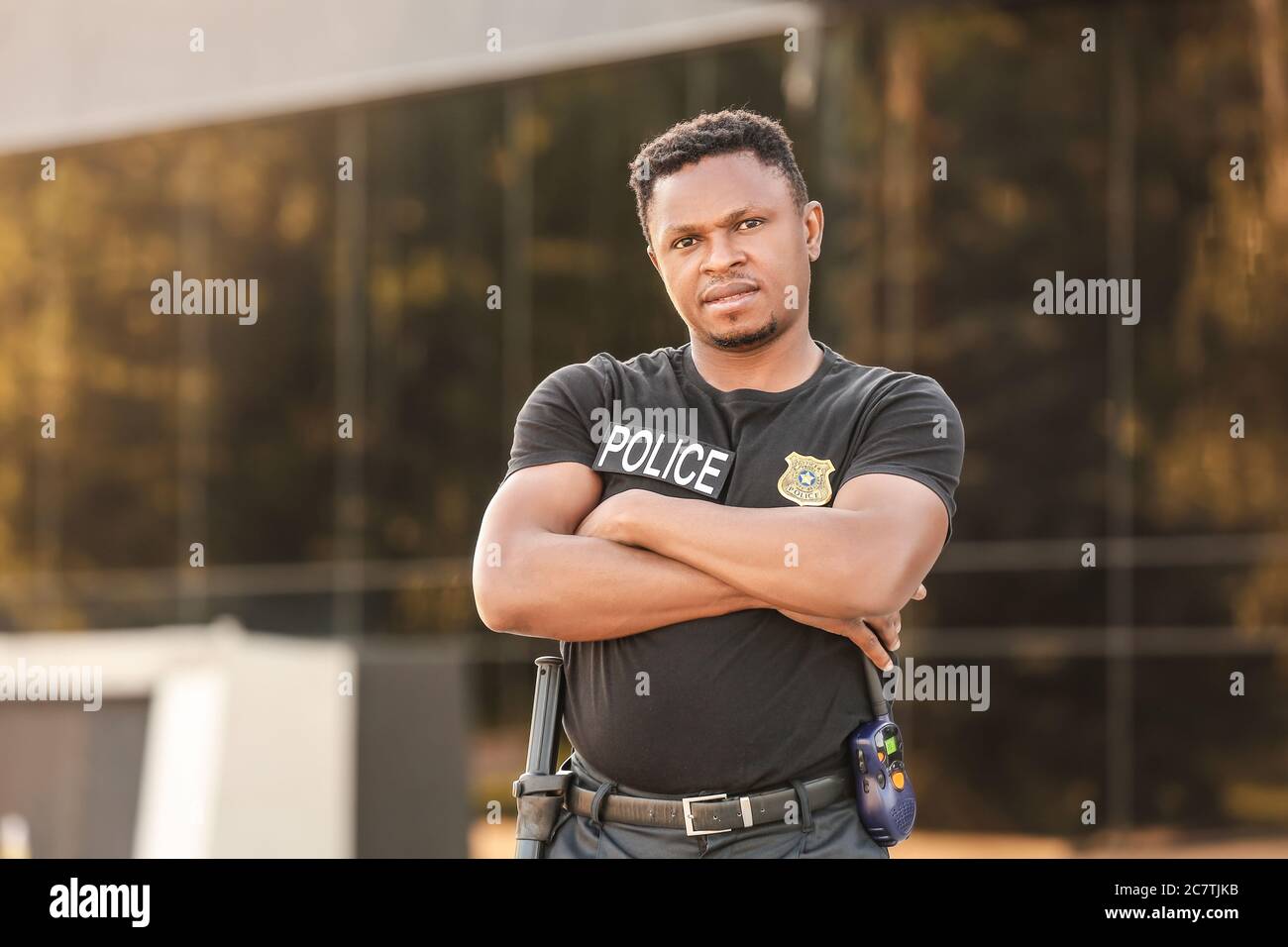 African-American police officer in the street Stock Photo - Alamy