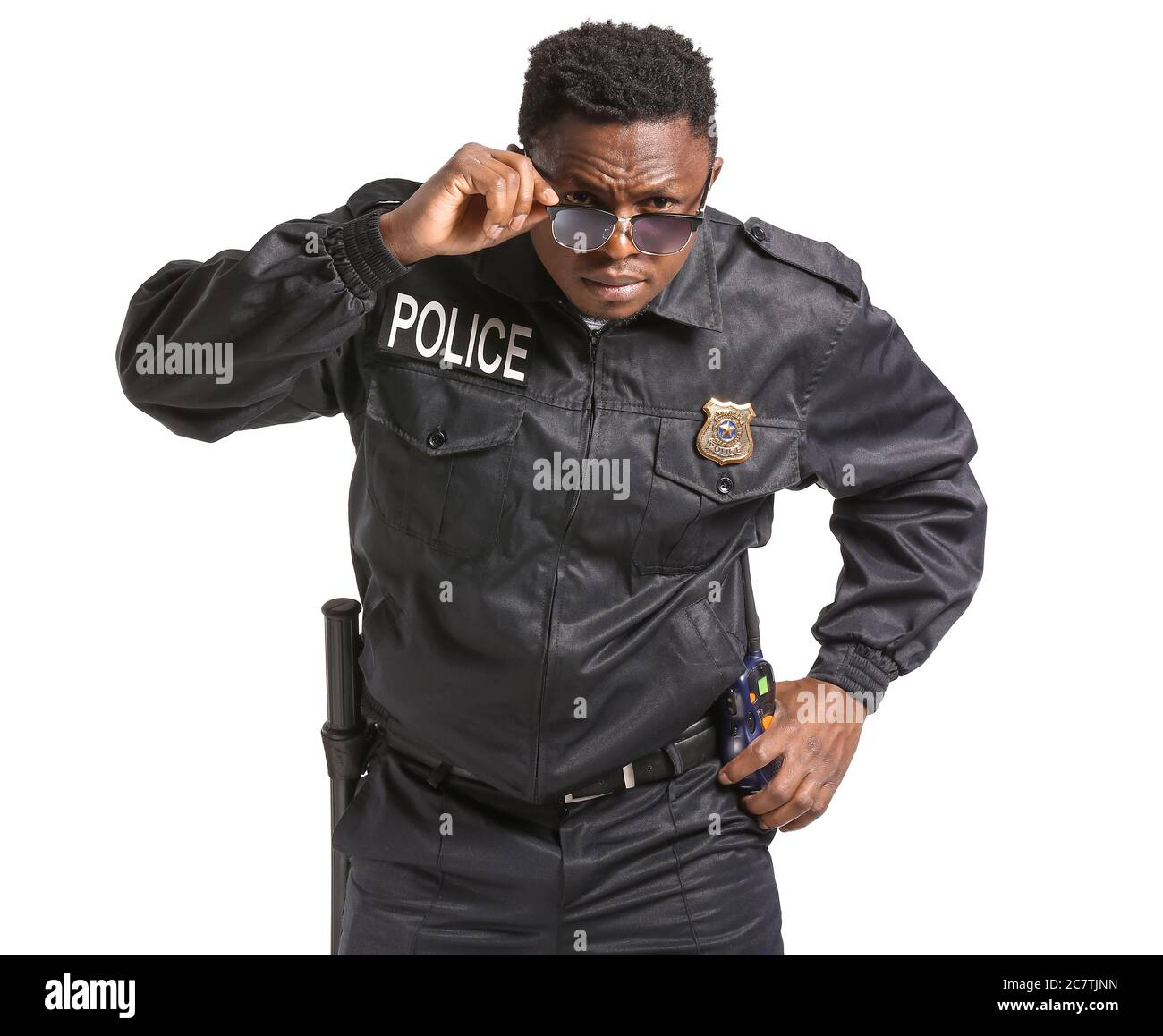 Aggressive African-American police officer on white background Stock ...