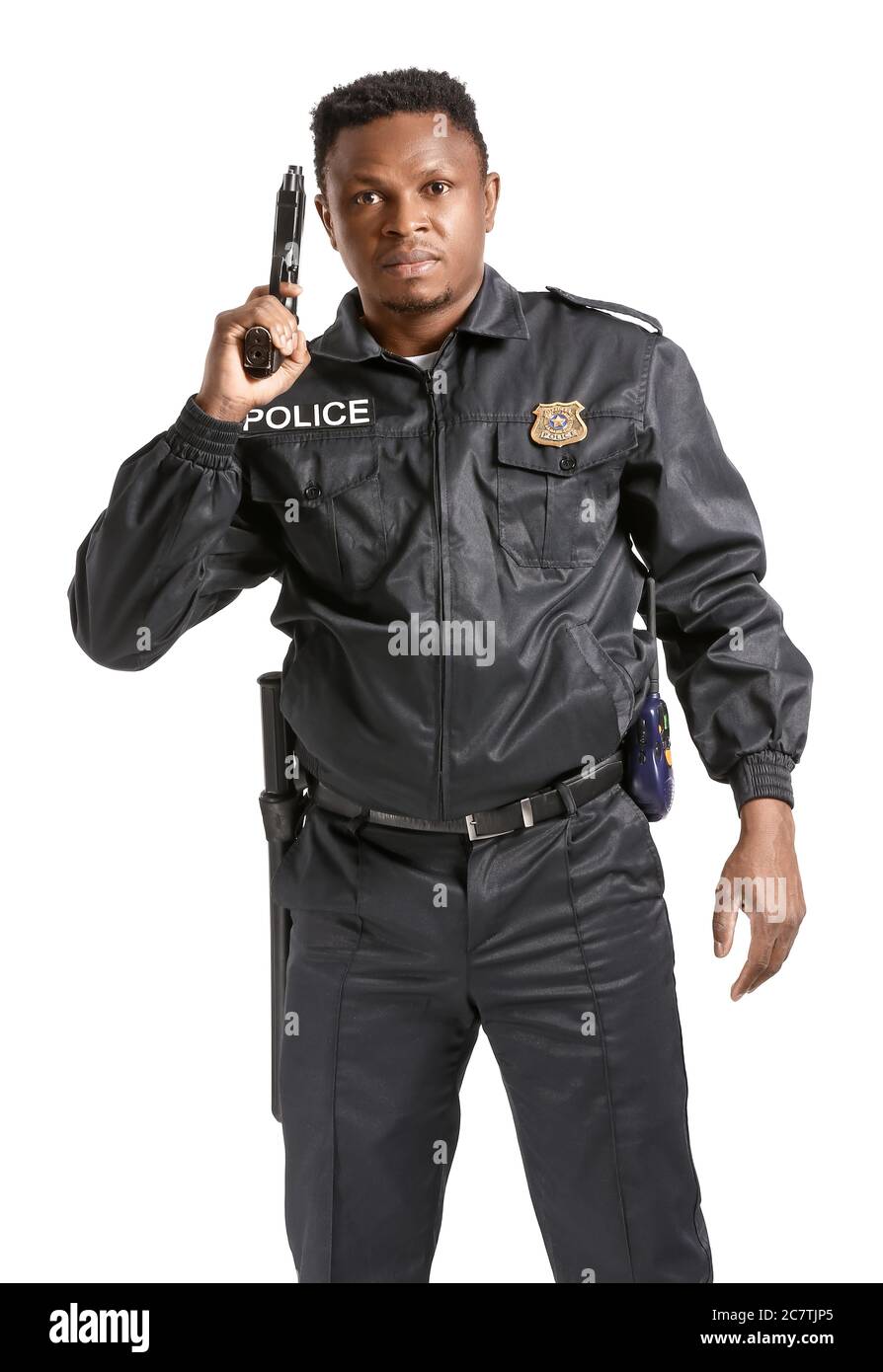 Aggressive African-American police officer with gun on white background ...