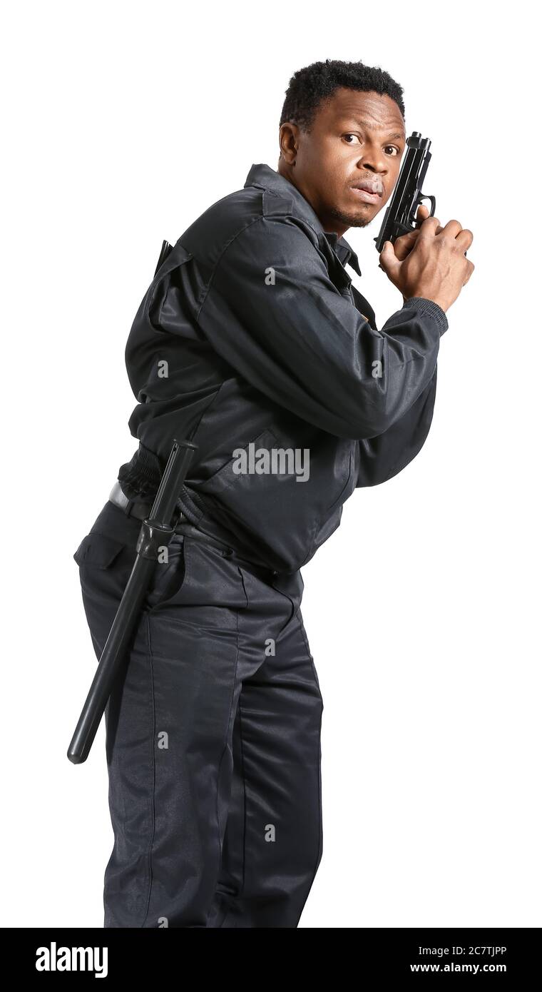 African-American police officer with gun on white background Stock ...