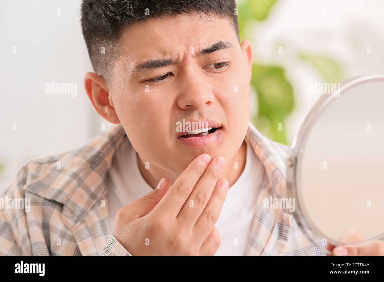 Asian man looking mirror hi-res stock photography and images - Alamy