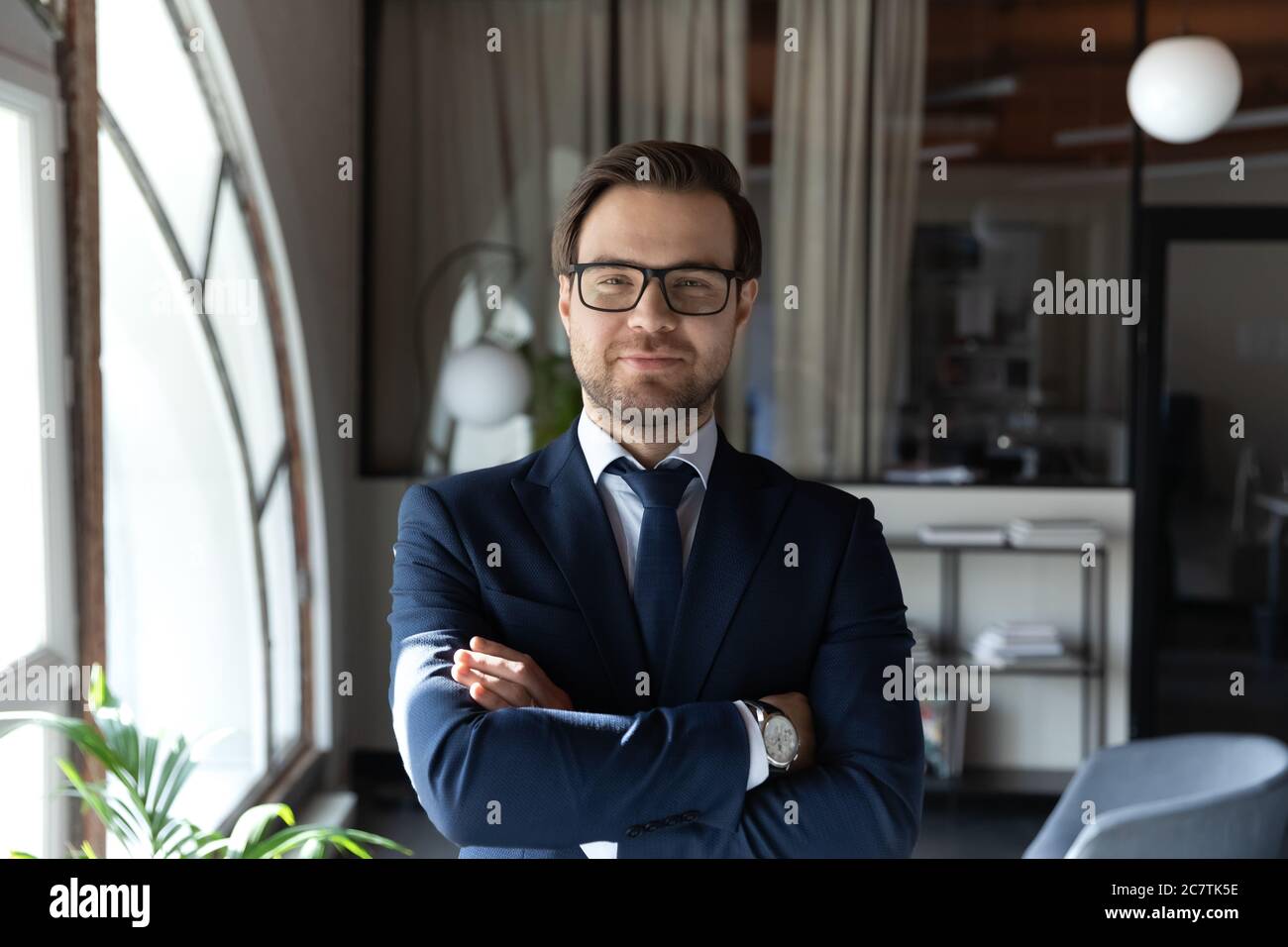 Profile picture of confident businessman posing at workplace Stock ...
