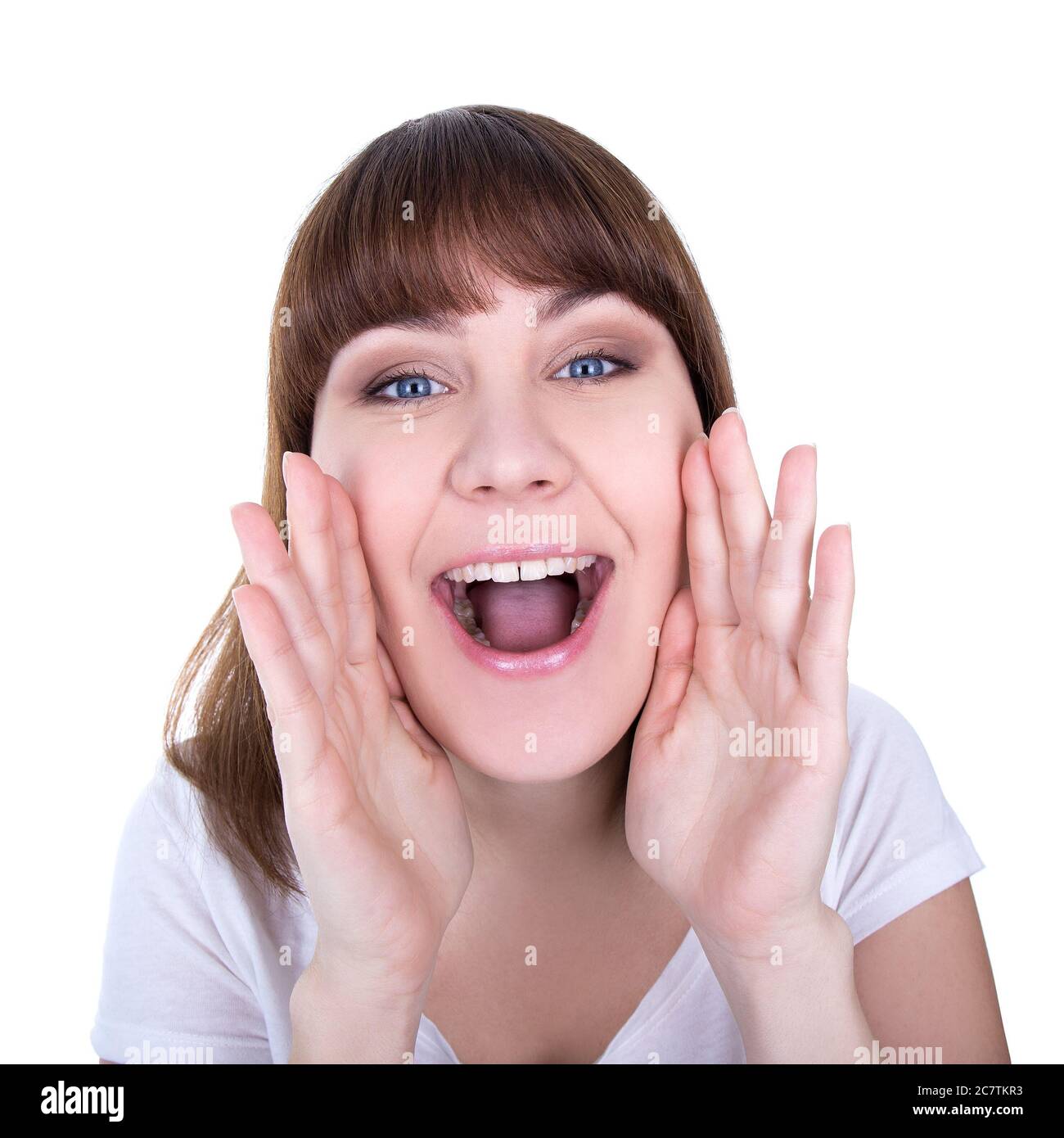 portrait of young beautiful woman loud screaming or calling out to ...