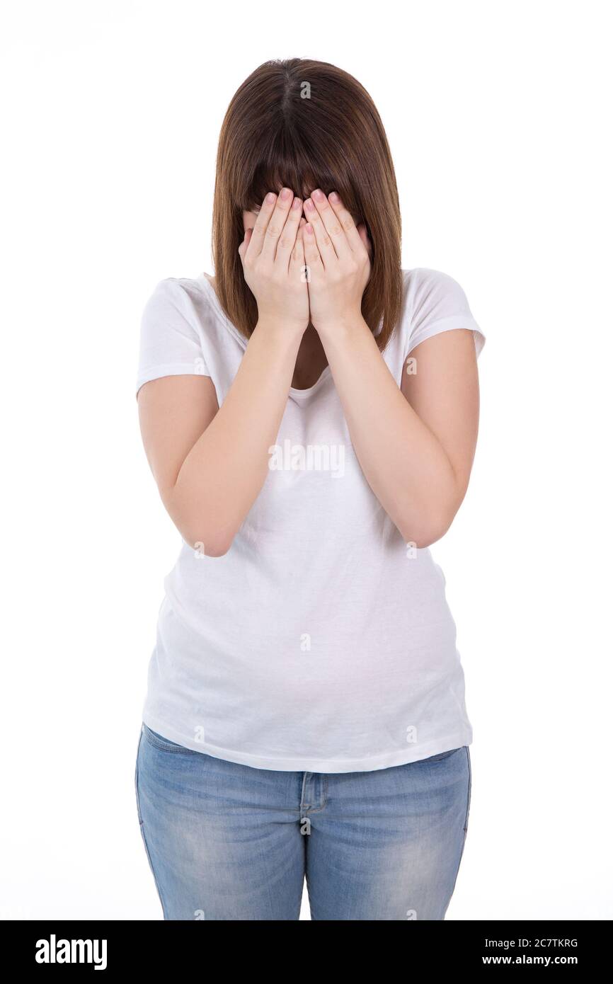 young woman crying and covering face with hands isolated on white ...