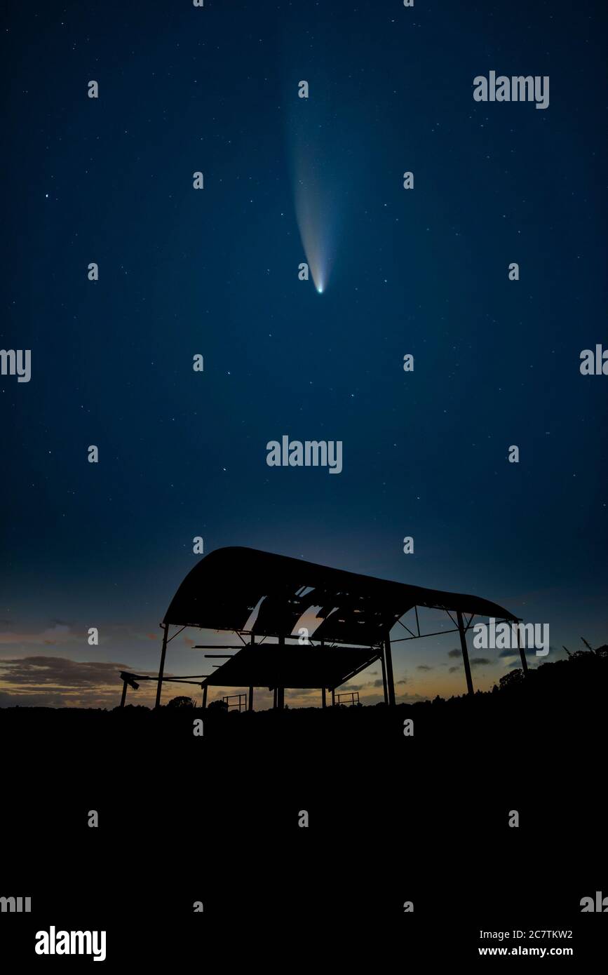 Digital composite image of Neowise Comet over Beautiful landscape image ...