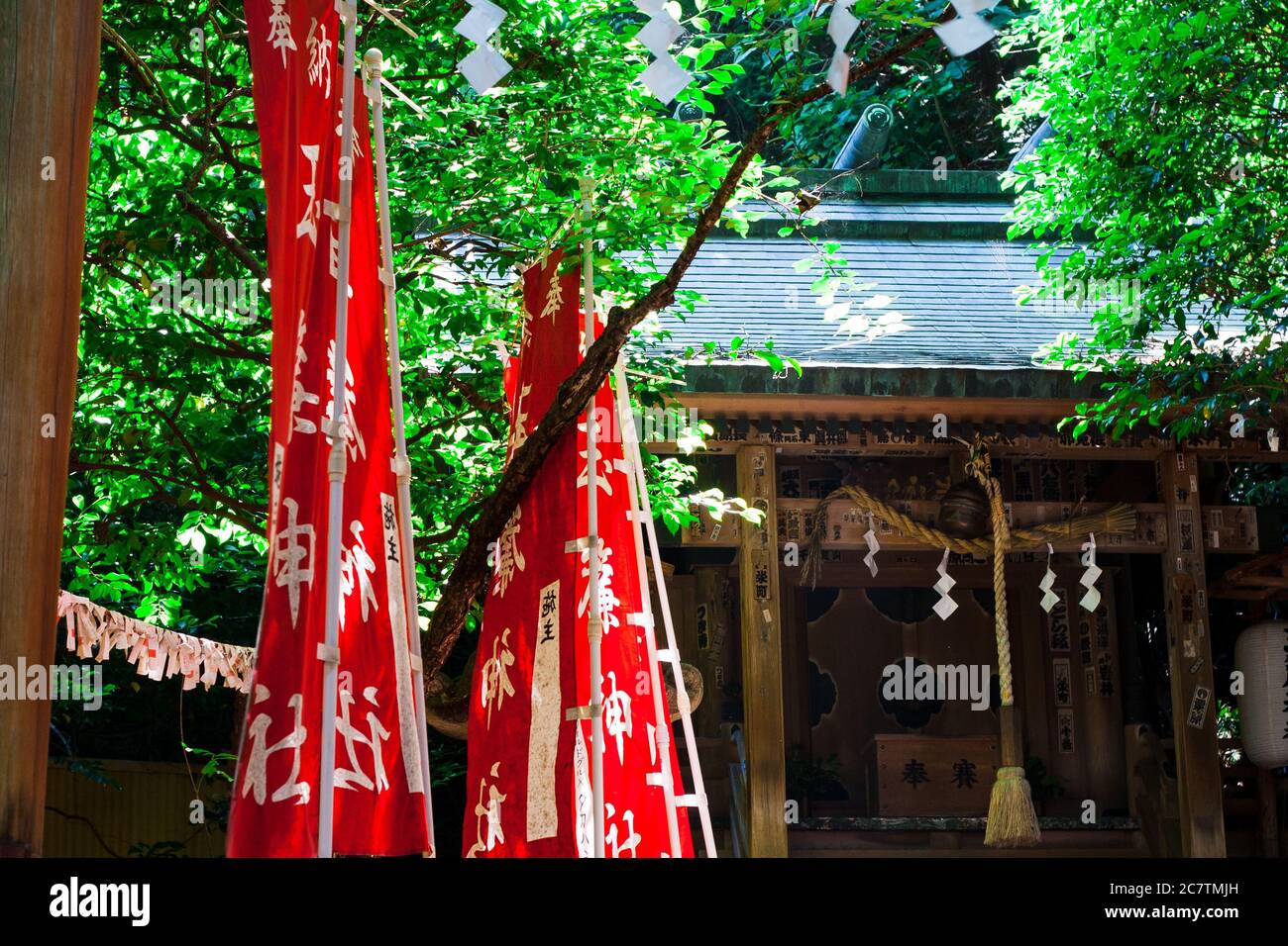 Japanese torii gate on the background of a temple Stock Photo - Alamy