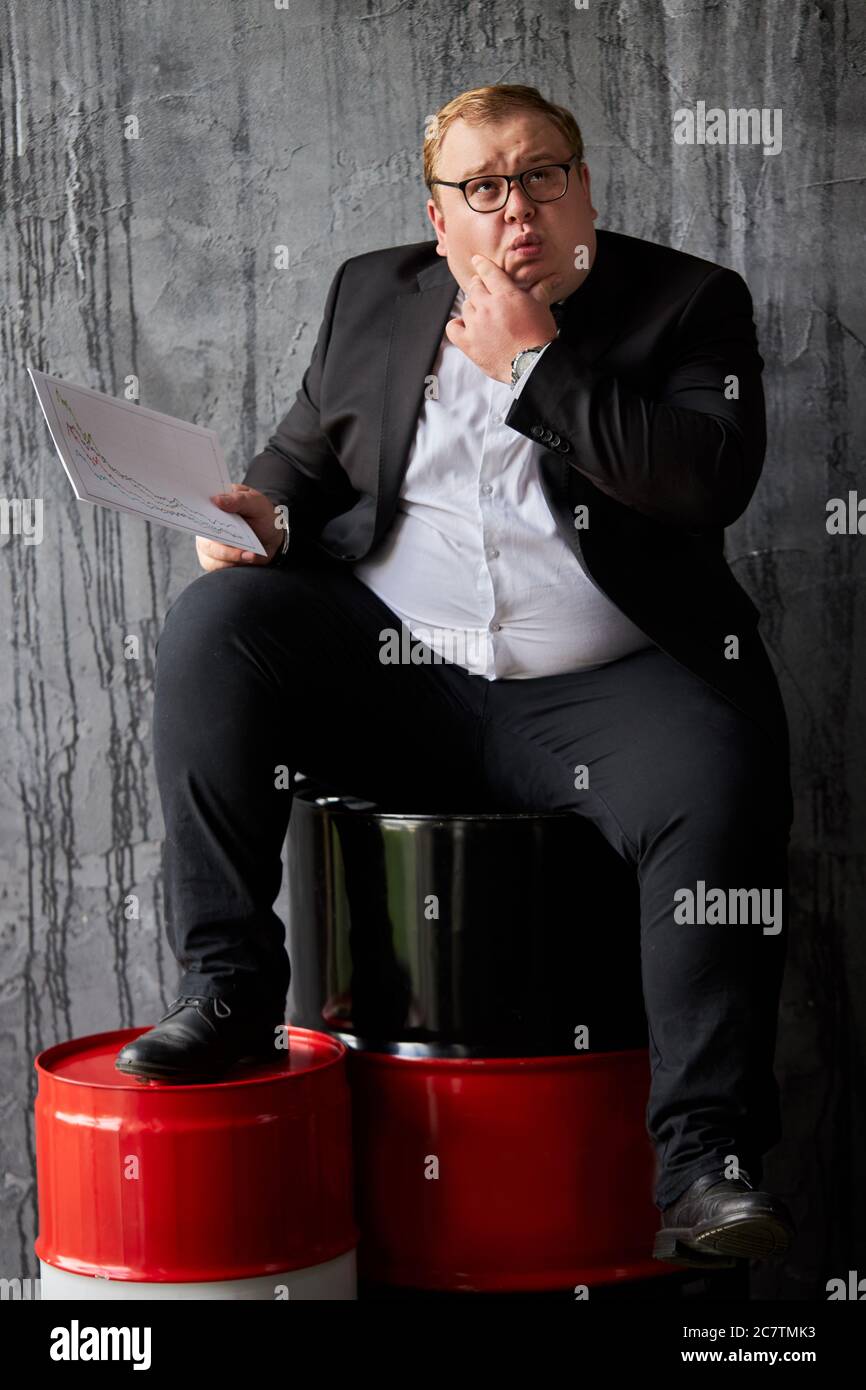 Fat man hard hat hi-res stock photography and images - Alamy