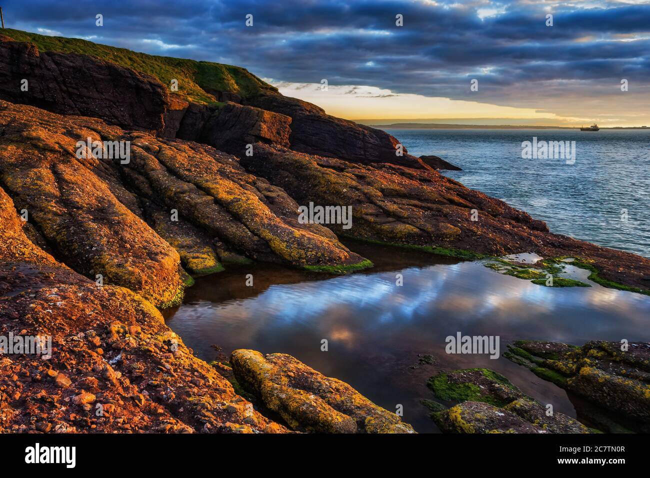 Scenic Irish coast of the Celtic Sea at sunrise in south of Ireland ...
