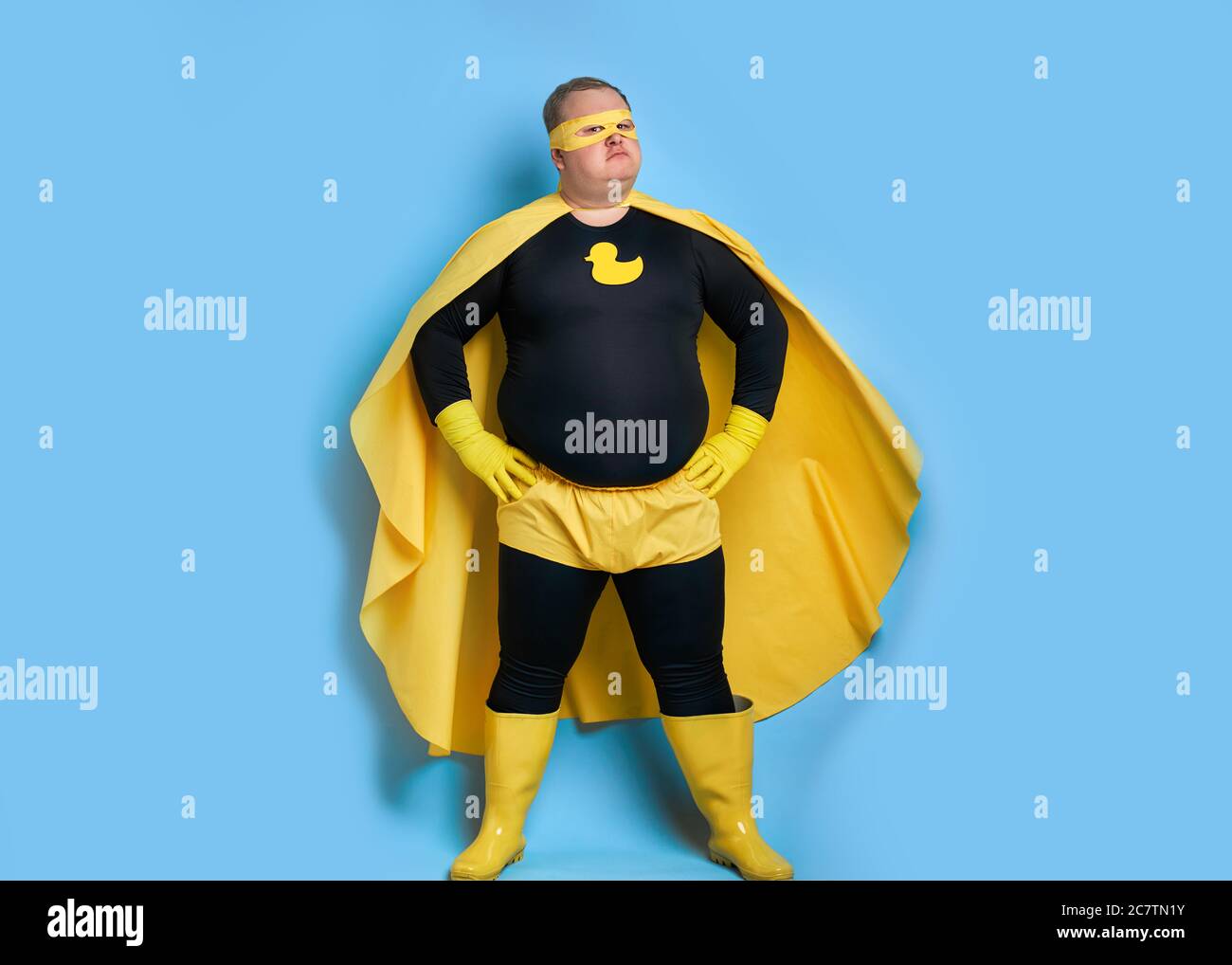 let's save the planet from dirt portrait of cleaning fat man in yellow ...