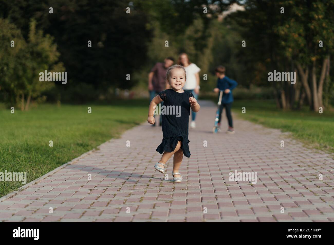 Kids Following Parents High Resolution Stock Photography and Images - Alamy