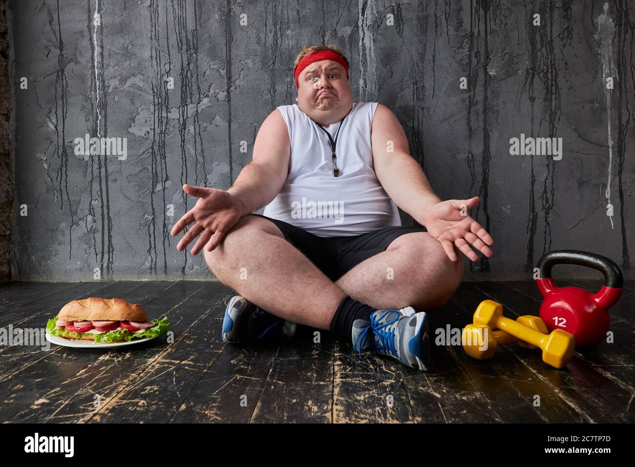 sad fat caucasian man is in a difficult position, man wants to eat a ...