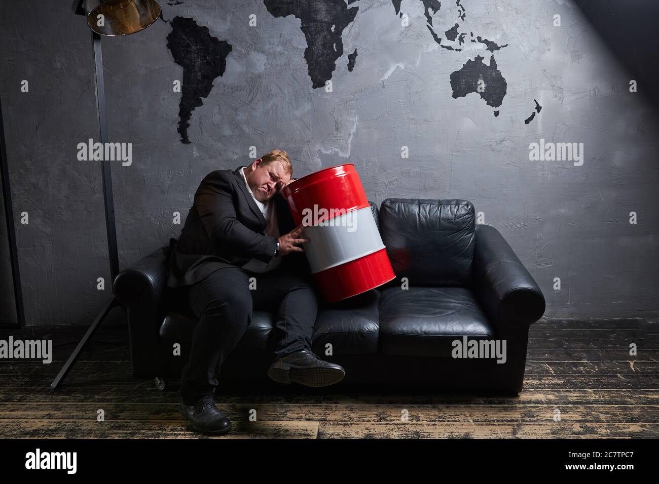 dolorous caucasian fat oilman is disappointed with price drop, he sits ...