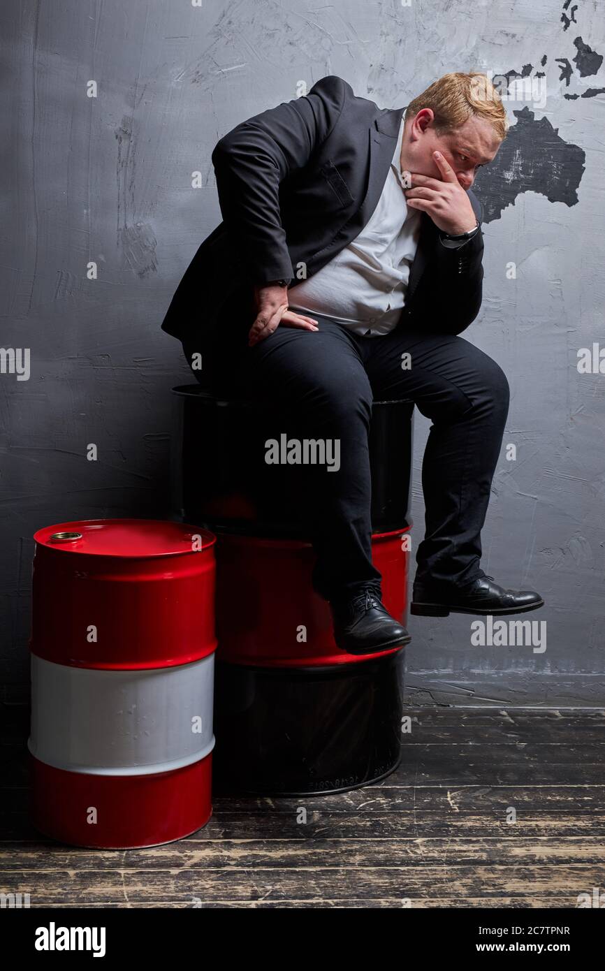 depressed fat caucasian oilman needs new job, his oil company is failed ...