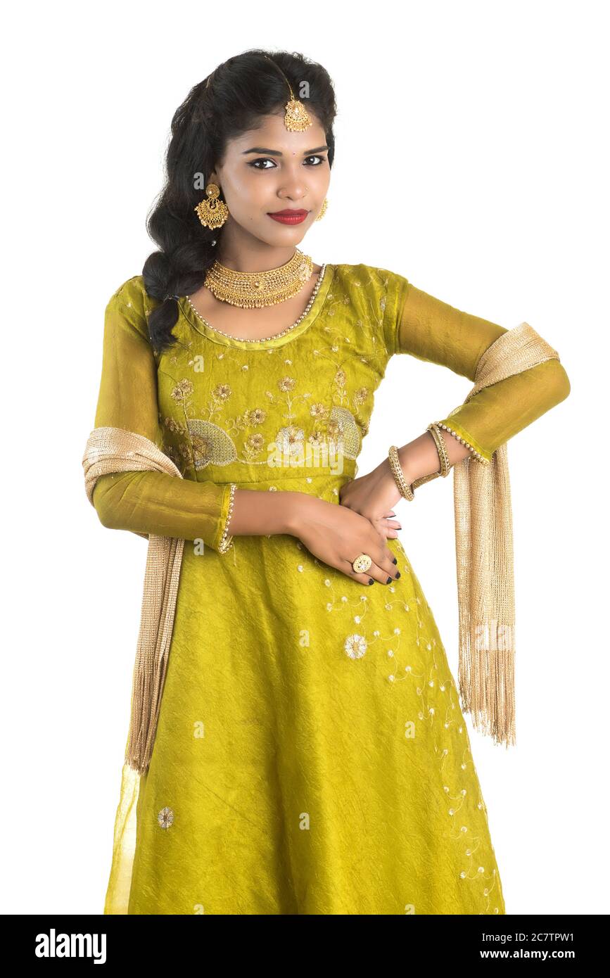 Portrait of beautiful traditional Indian girl posing on white ...