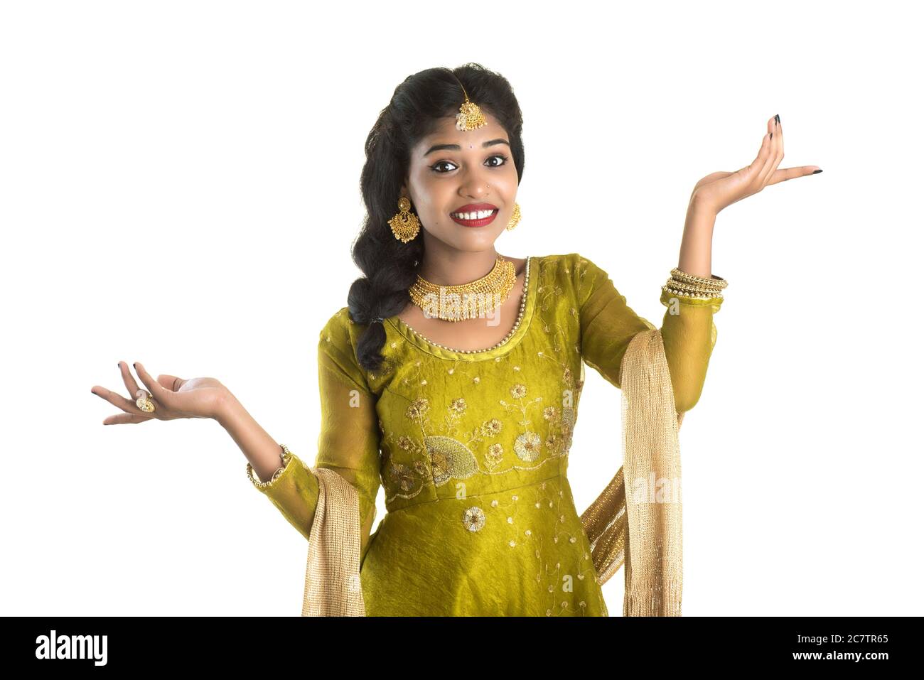 Smiling cheerful girl showing sign isolated on white background Stock ...