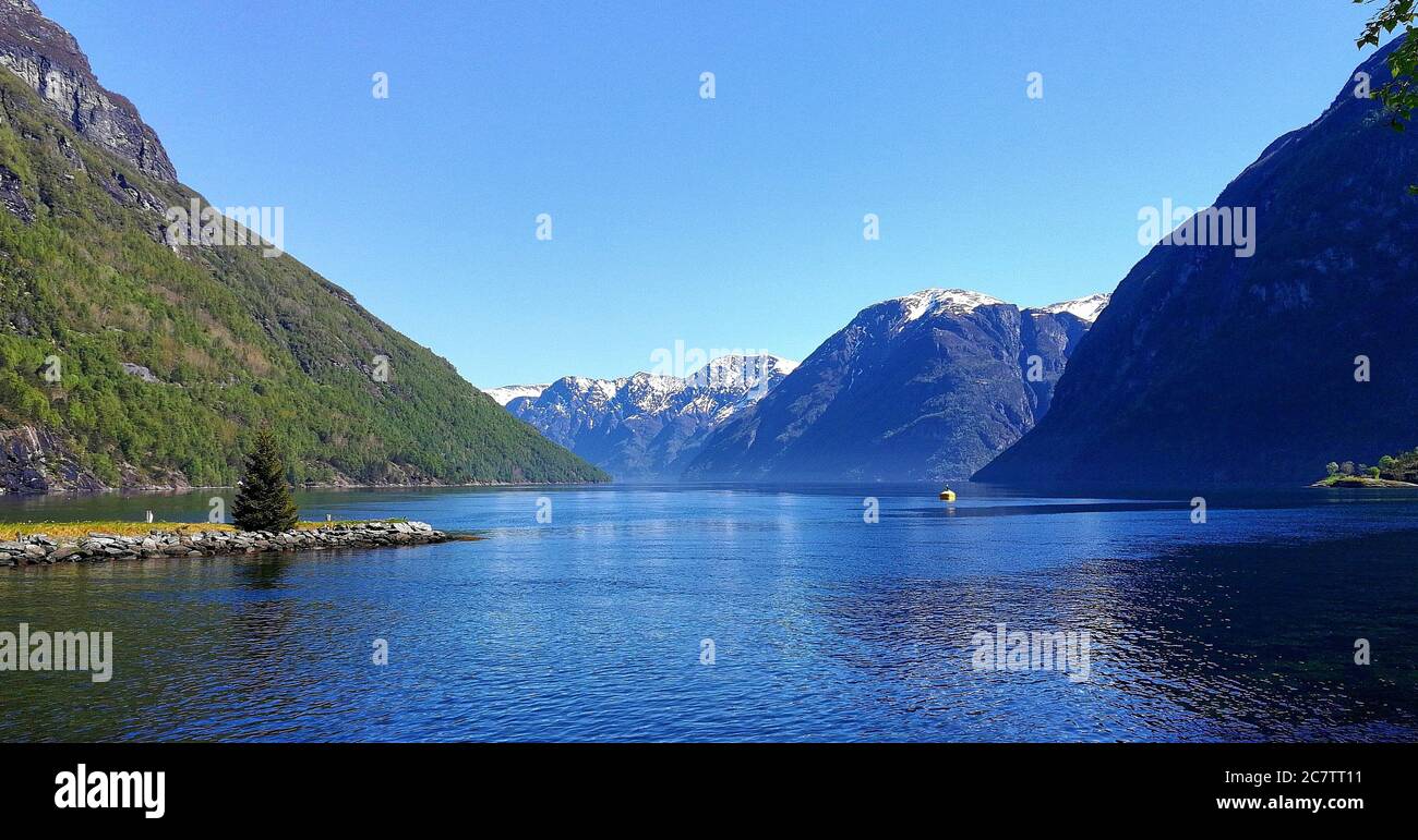 Beautiful scenery of Norwegian fjords under a bright sky Stock Photo ...