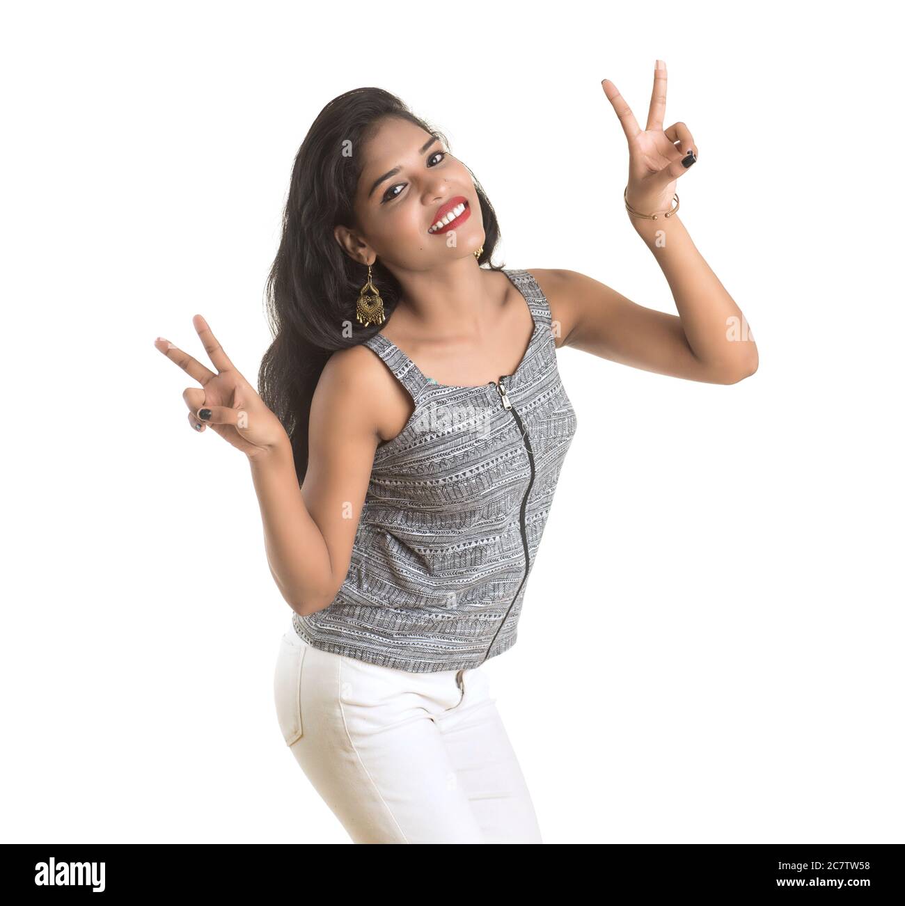 Smiling cheerful girl showing sign isolated on white background Stock ...