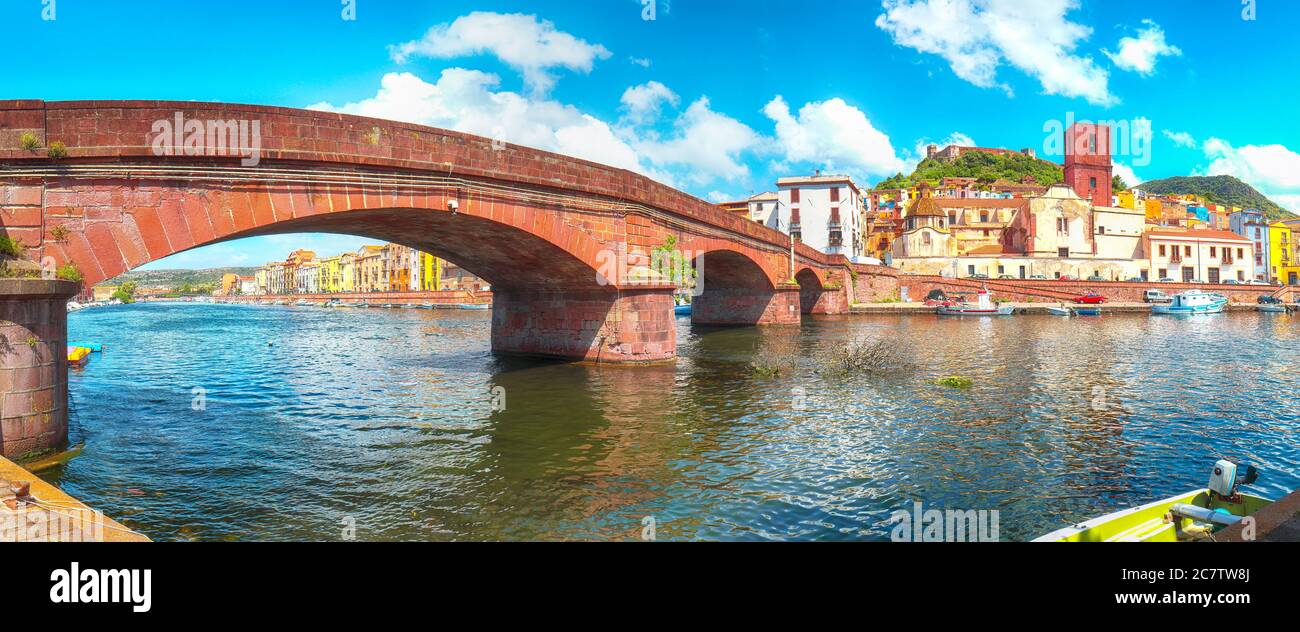 Amazing cityscape of Bosa town with Ponte Vecchio bridge across the ...