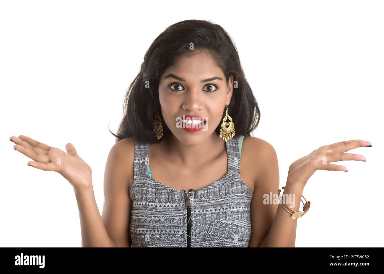 Smiling cheerful girl showing sign isolated on white background Stock ...