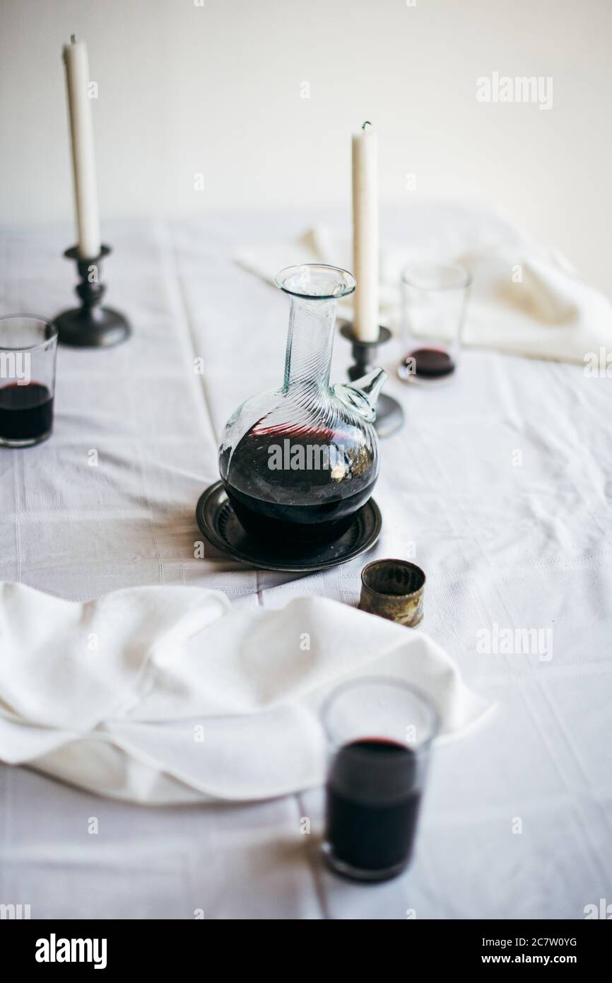 Messy table setting after dinner Stock Photo - Alamy