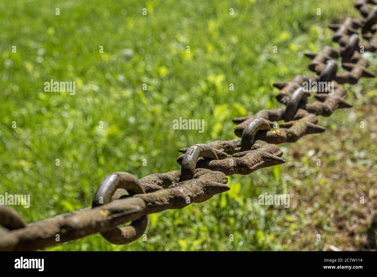 Railings from an ancient metal chain. Closeup of an old chain railings ...