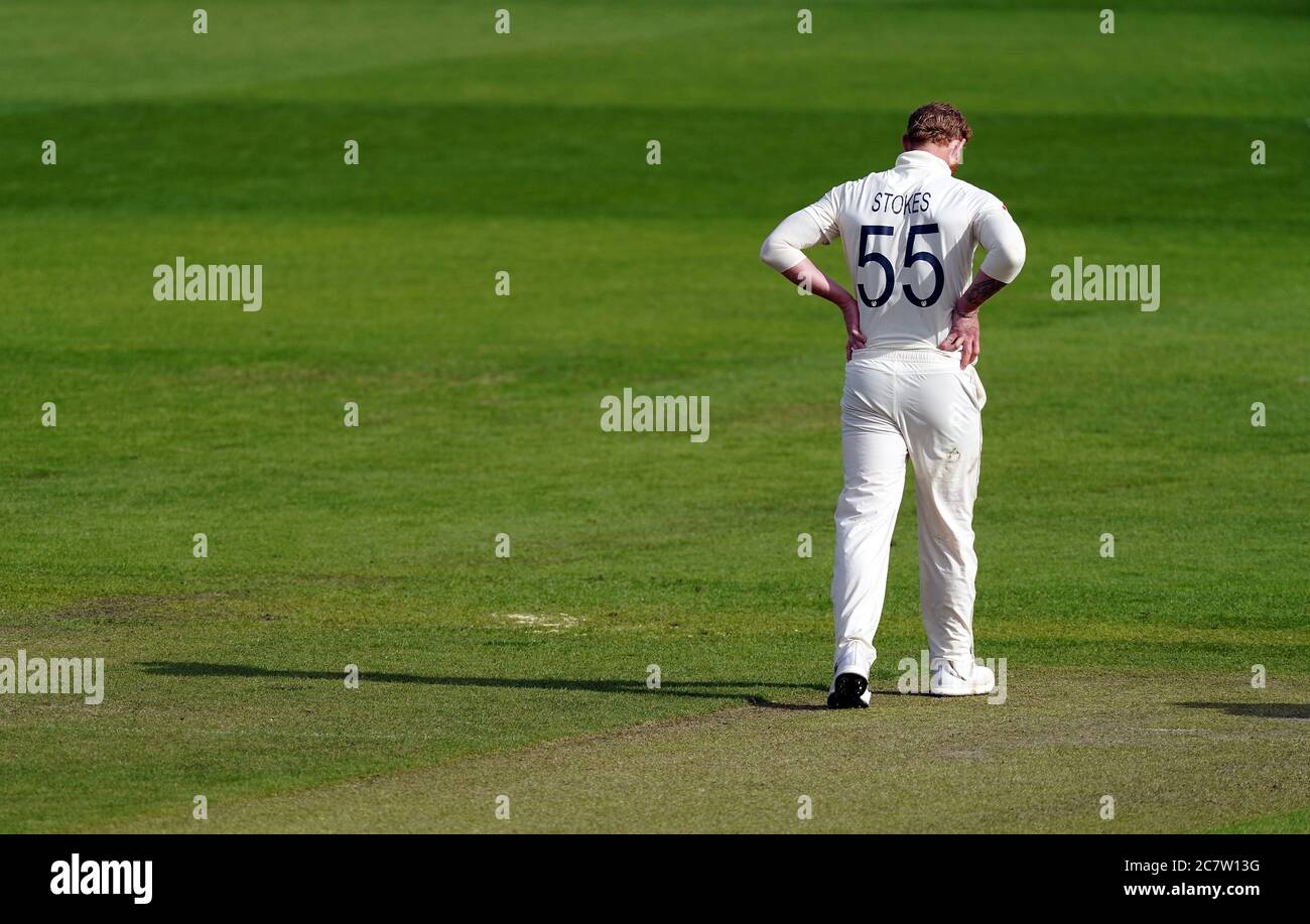 England’s Ben Stokes reacts as he struggles to bowl during day four of ...
