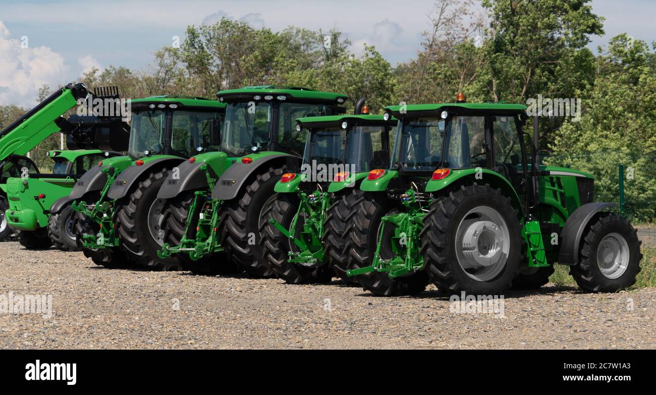 New agricultural tractors in stock Stock Photo - Alamy