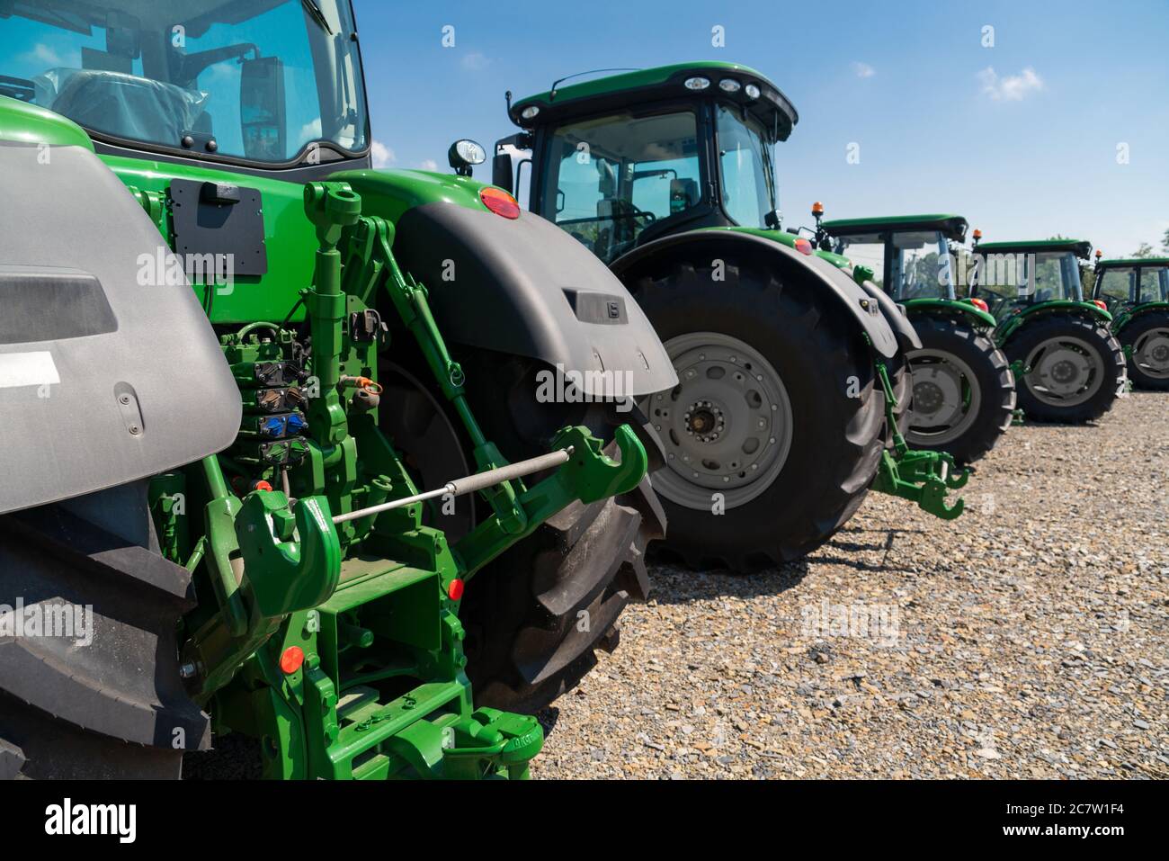 New agricultural tractors in stock Stock Photo - Alamy